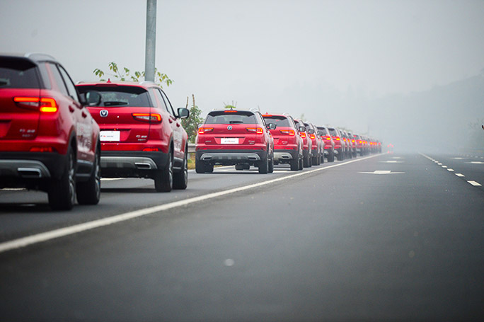 55 drivers let go of the wheel as they ride in the largest parade of ...