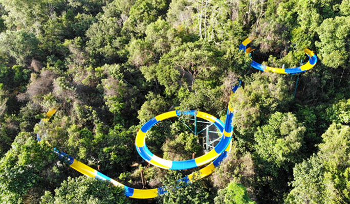 Ride through the trees on the world’s longest mat water slide – all ...