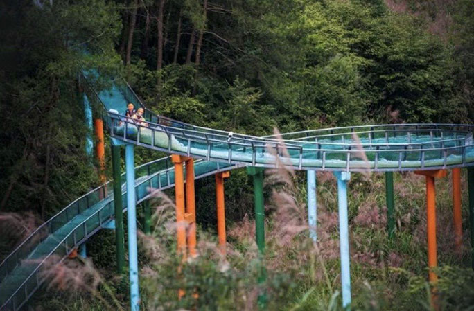Glide down the world’s longest mountain water slide which is nearly 3 ...