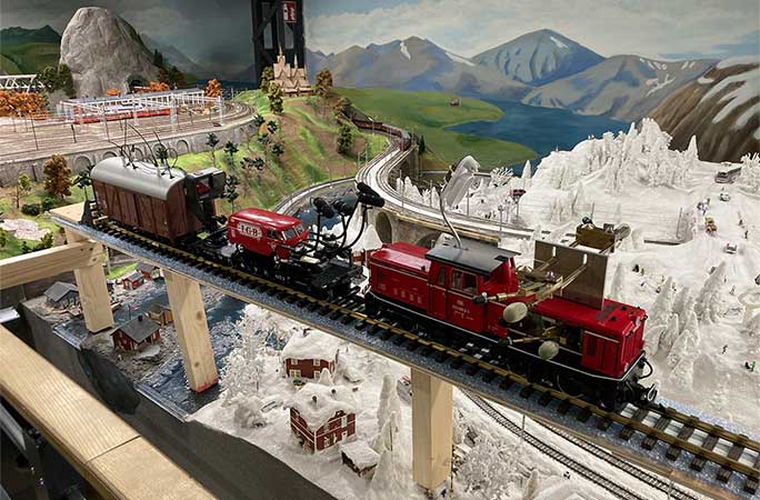Model train plays record-breaking melody with 2,840 water glasses ...