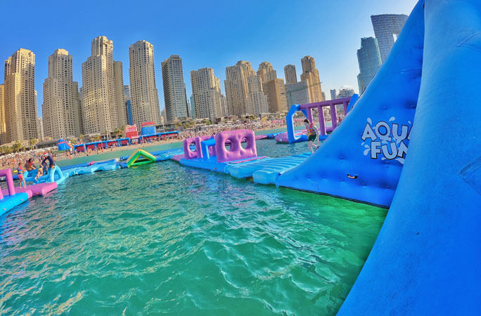 Dive into the world’s largest inflatable aqua park located in Dubai ...