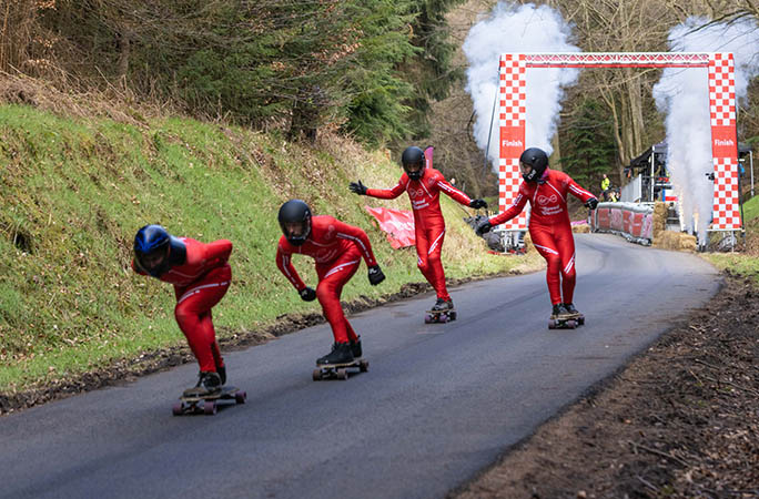 Daredevils reach 52.788 mph in fastest downhill skateboard record ...