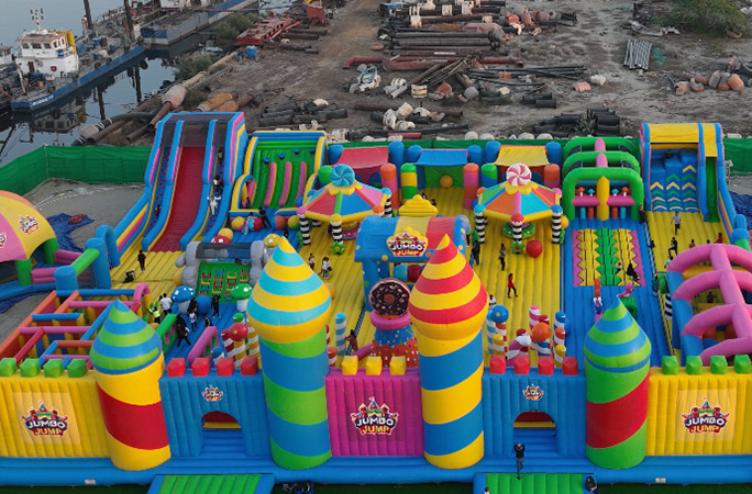 Visitors jump for joy on the world’s largest bouncy castle | Guinness ...