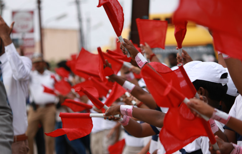 Most people waving traffic safety flags simultaneously | Guinness World ...