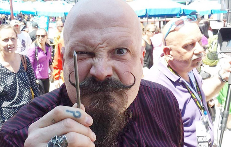 Most nails inserted into the nose in 30 seconds (male) | Guinness World ...