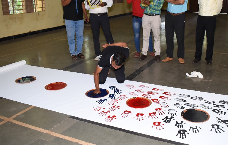 Most painted handprints in one minute | Guinness World Records