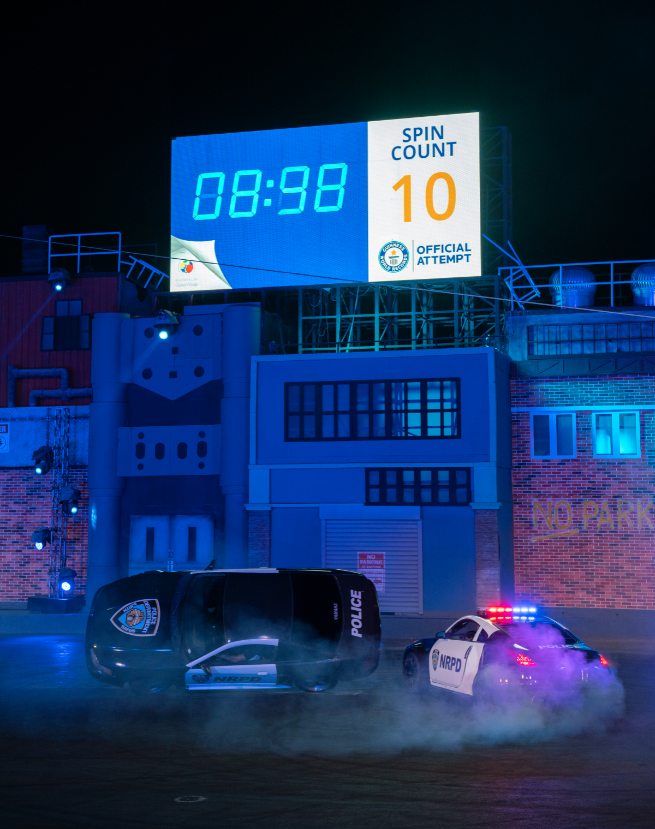 Most donuts (spins) around a car driving on two wheels in one minute ...