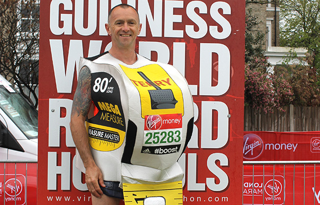 Fastest marathon dressed as a tool (male) | Guinness World Records