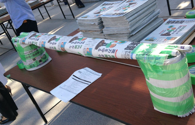 Longest bridge made of newspaper in three minutes (team) | Guinness ...