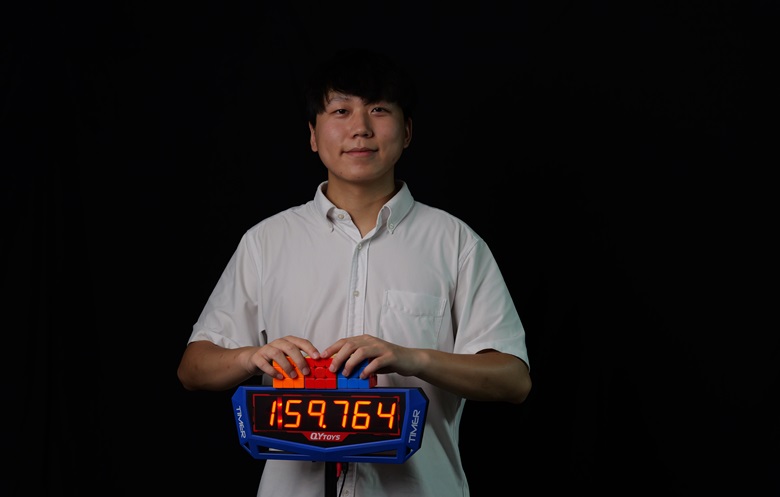 Fastest time to solve three rotating puzzle cubes whilst juggling ...