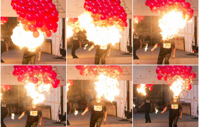 Most balloons burst with a blown flame by a fire breather | Guinness ...