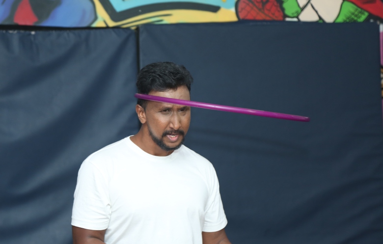 Most hula hoop revolutions around the head in one minute | Guinness ...