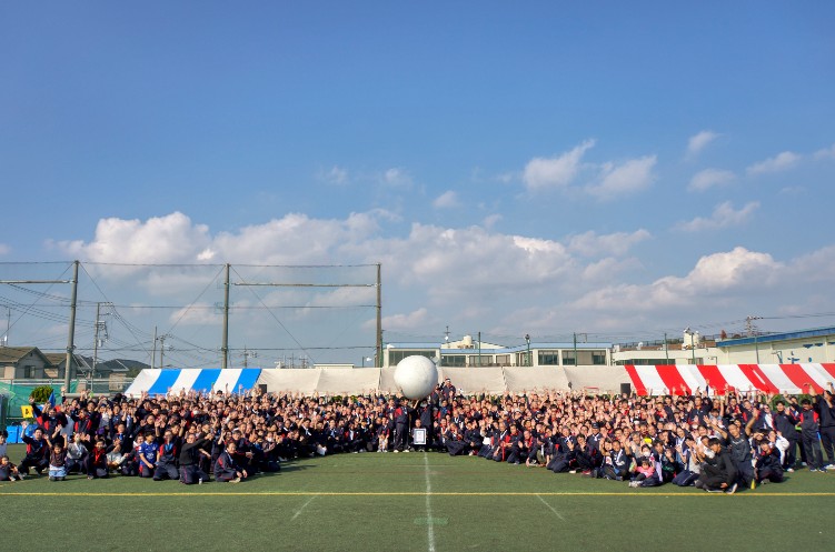 Fastest time to pass an oodama ball 100 m over the head (team ...