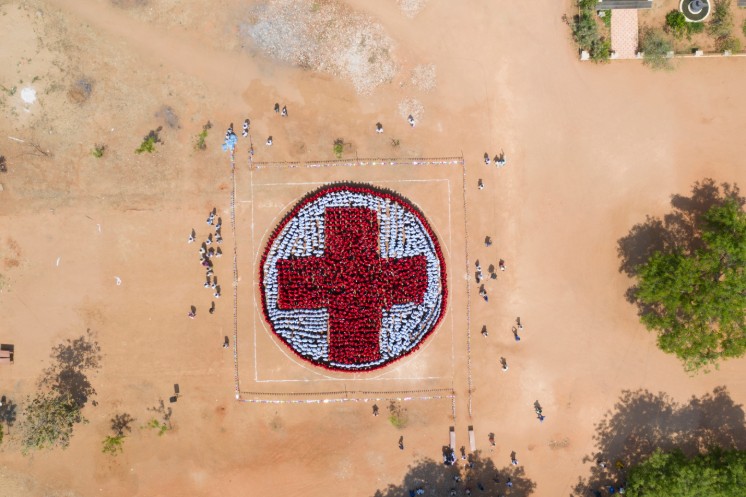 Largest human image of a medical sign | Guinness World Records