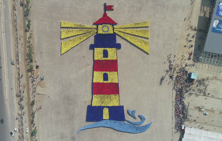 Largest human image of a lighthouse | Guinness World Records