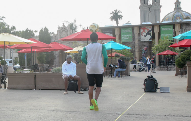 Farthest distance moonwalking with a football balanced on the head ...