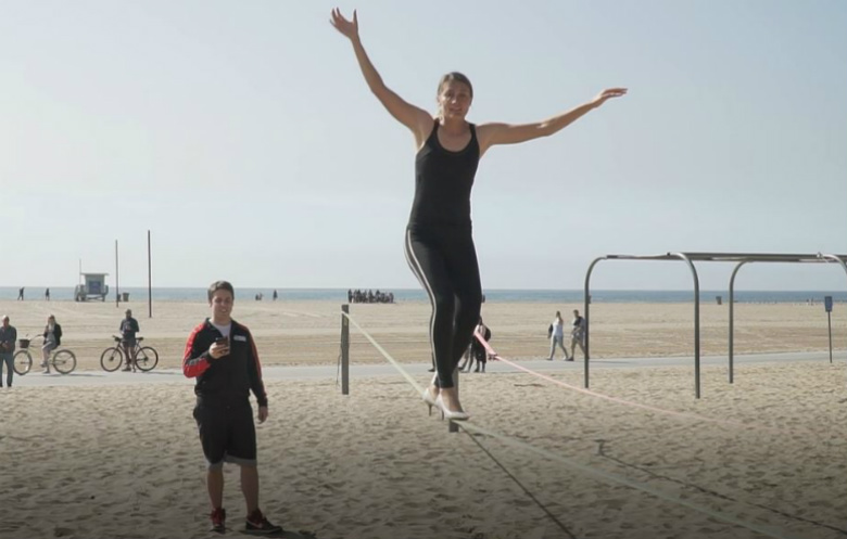 Most bum bounces in high heels on a slackline in one minute | Guinness ...