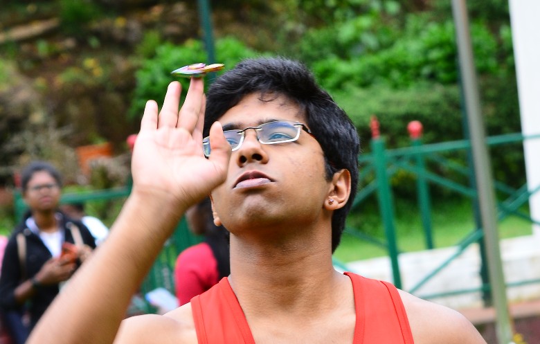 Most single wrist rotation while holding a fidget spinner in one minute ...