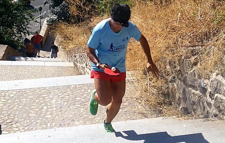 Fastest time to climb 50 stairs while balancing a table tennis ball on ...