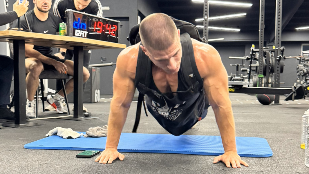Most push ups in one hour with a 20 lb pack | Guinness World Records