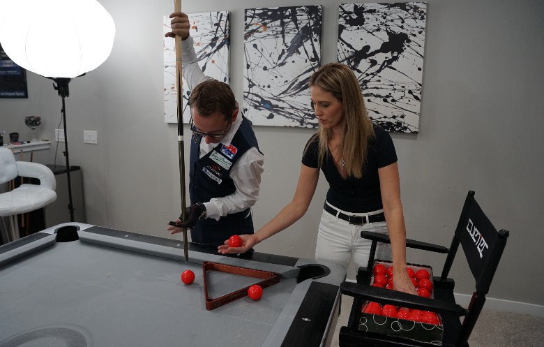 Most pool balls potted around a triangle in one minute | Guinness World ...