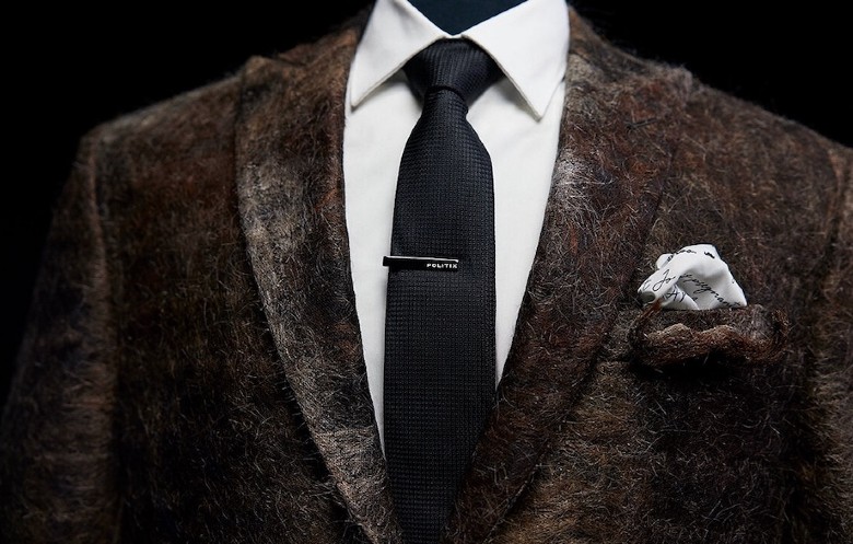 First suit made from moustache hair | Guinness World Records