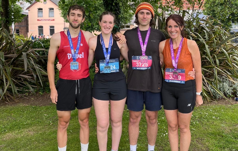 Fastest half marathon run by a mother and three children | Guinness ...