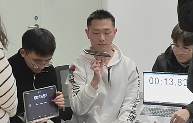 Most spins of a mobile phone on one finger in one minute | Guinness ...