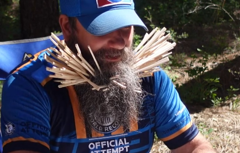 Most chopsticks put into a beard in one minute | Guinness World Records