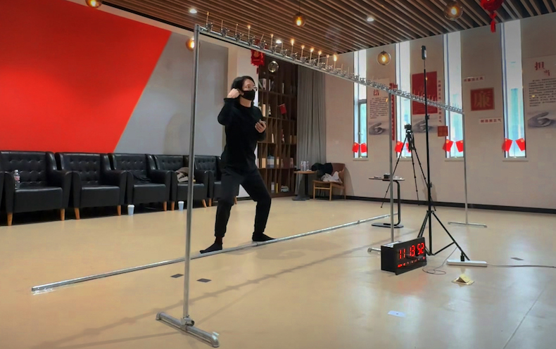 Most matches lit by throwing playing cards in one minute | Guinness ...