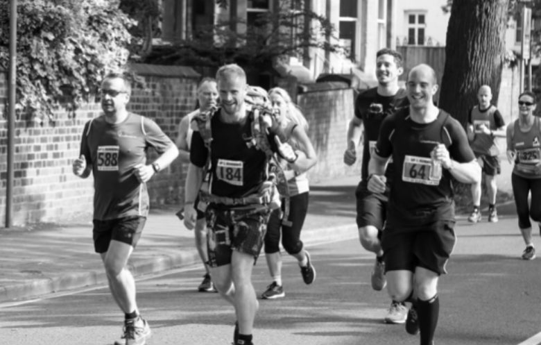 Fastest 10 km carrying a 100 lb pack (male) | Guinness World Records