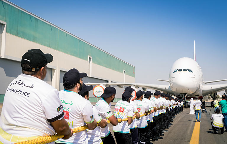 Heaviest aircraft pulled over 100 m by a team (male) | Guinness World ...