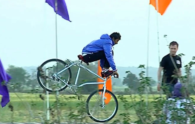 Longest bicycle stoppie (feet on handlebars) | Guinness World Records