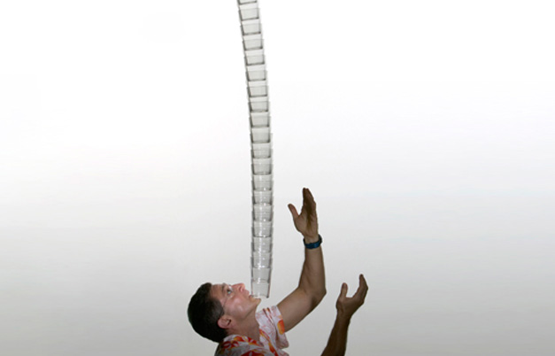 Most pint glasses balanced on the chin | Guinness World Records