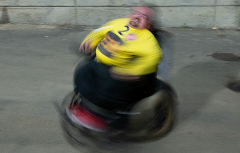 Most power wheelchair spins in one minute | Guinness World Records